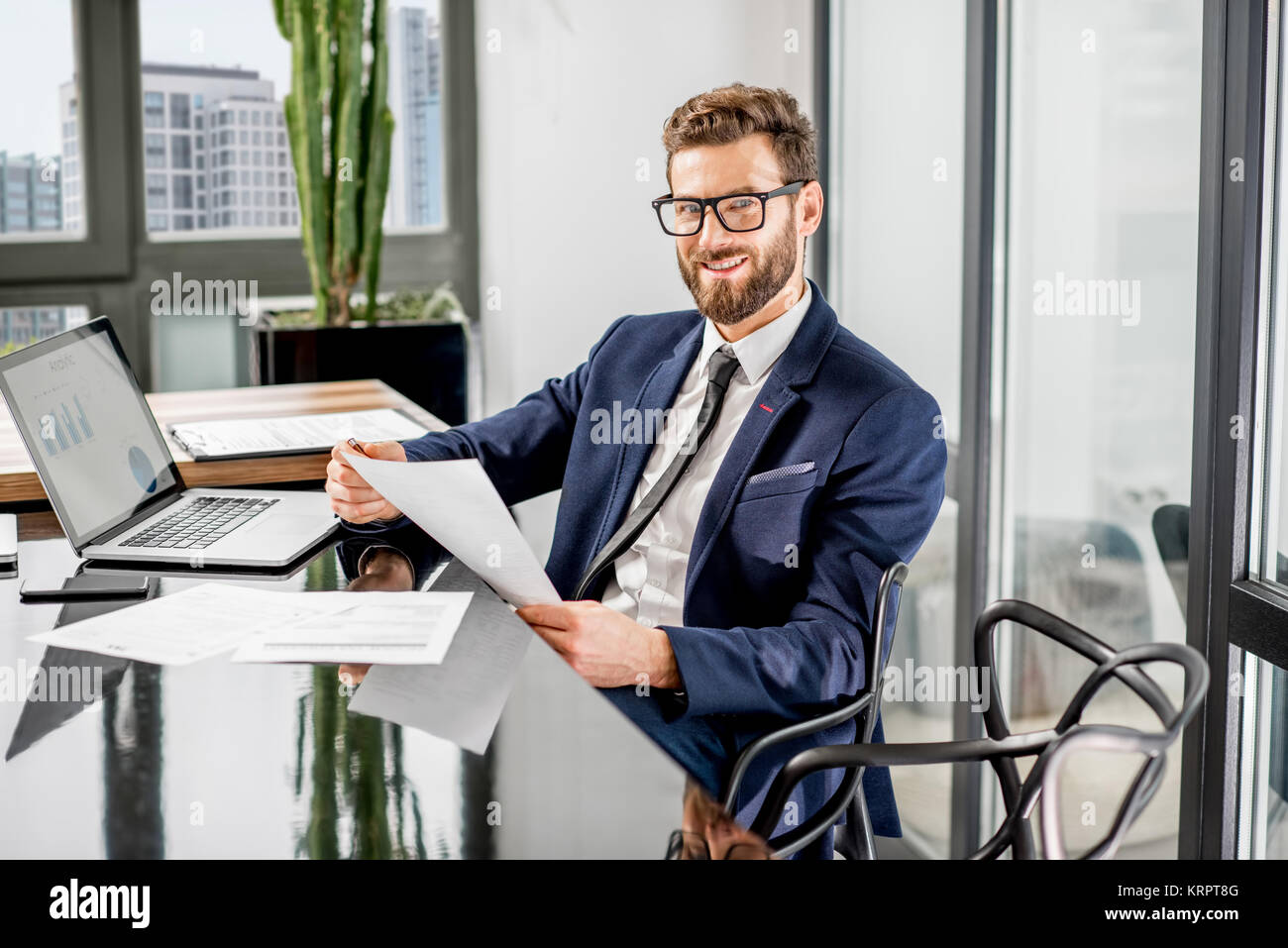 Banker working at the office Stock Photo - Alamy