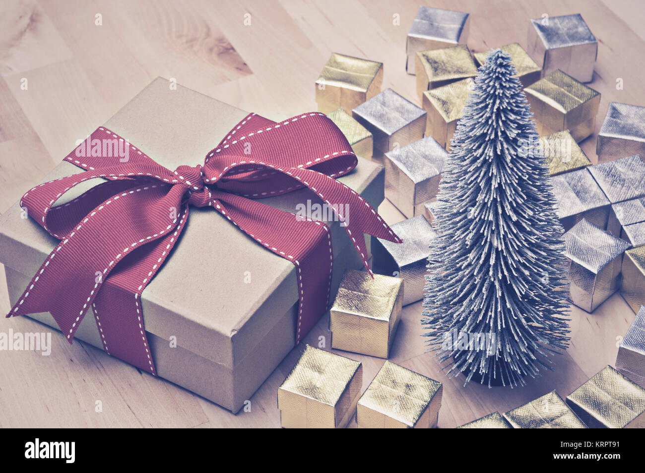 Gift box with red ribbon Stock Photo - Alamy