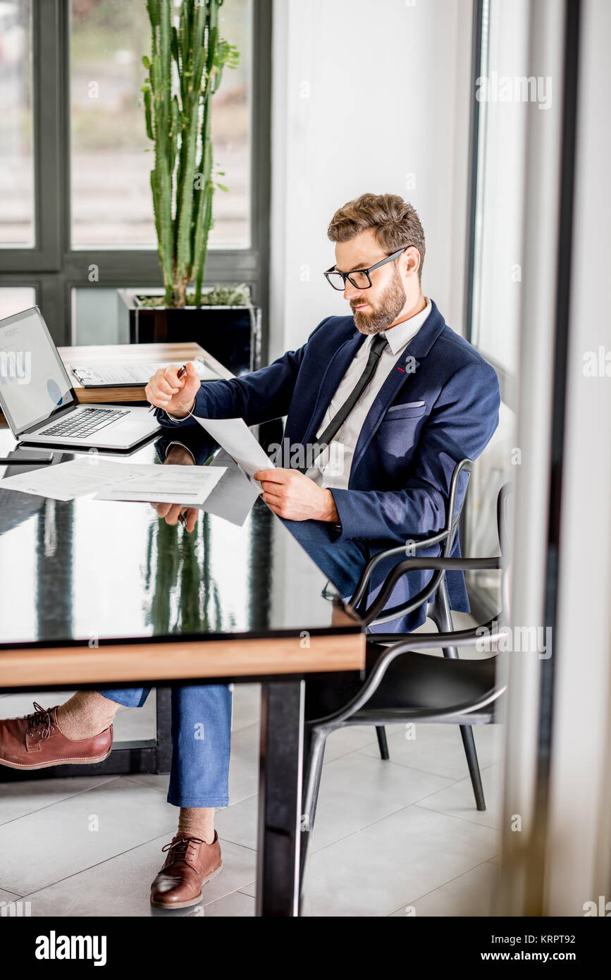 Banker working at the office Stock Photo - Alamy