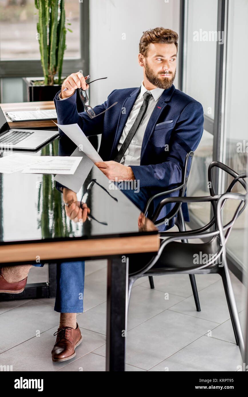 Banker working at the office Stock Photo - Alamy