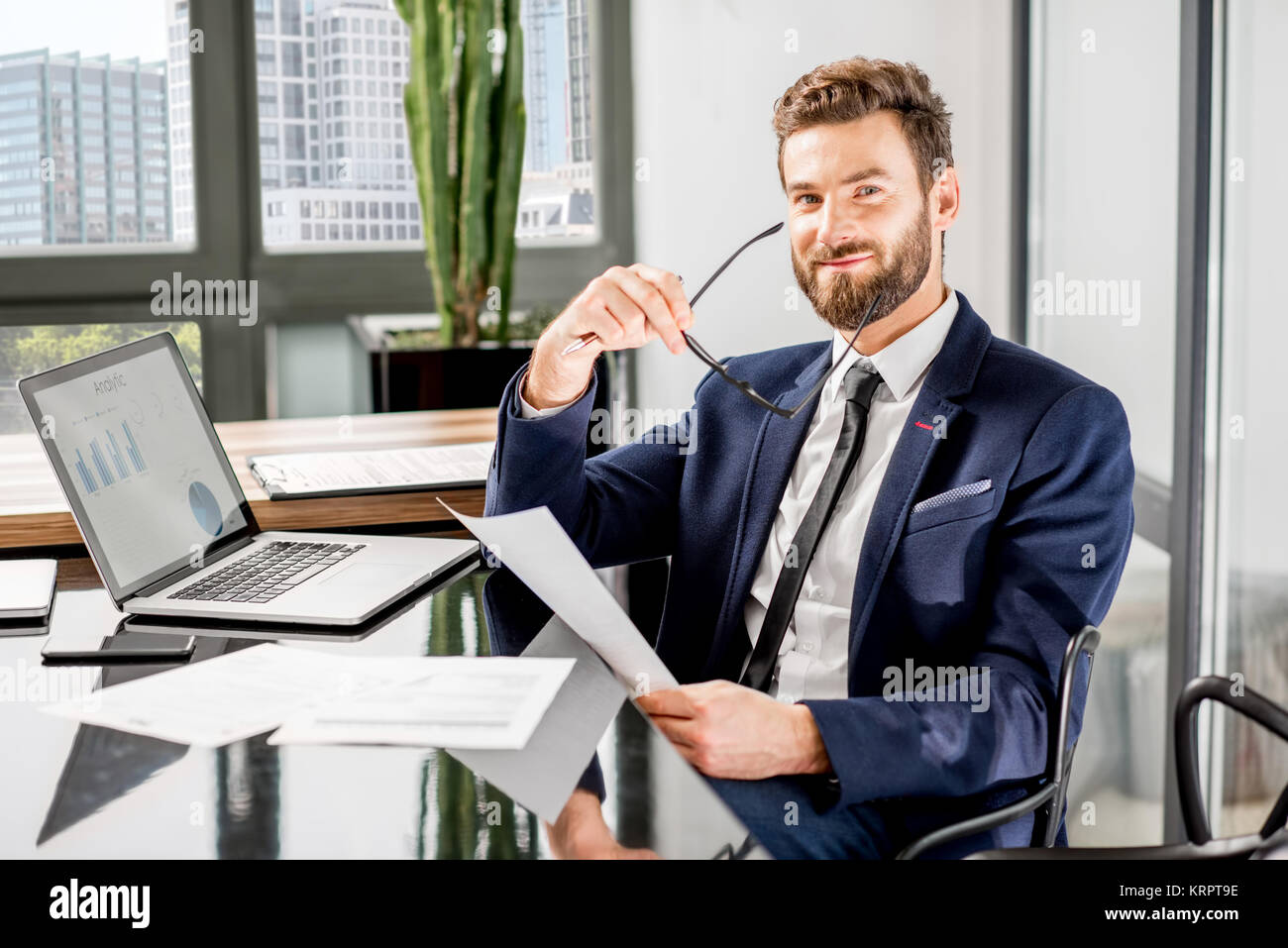 Banker working at the office Stock Photo - Alamy