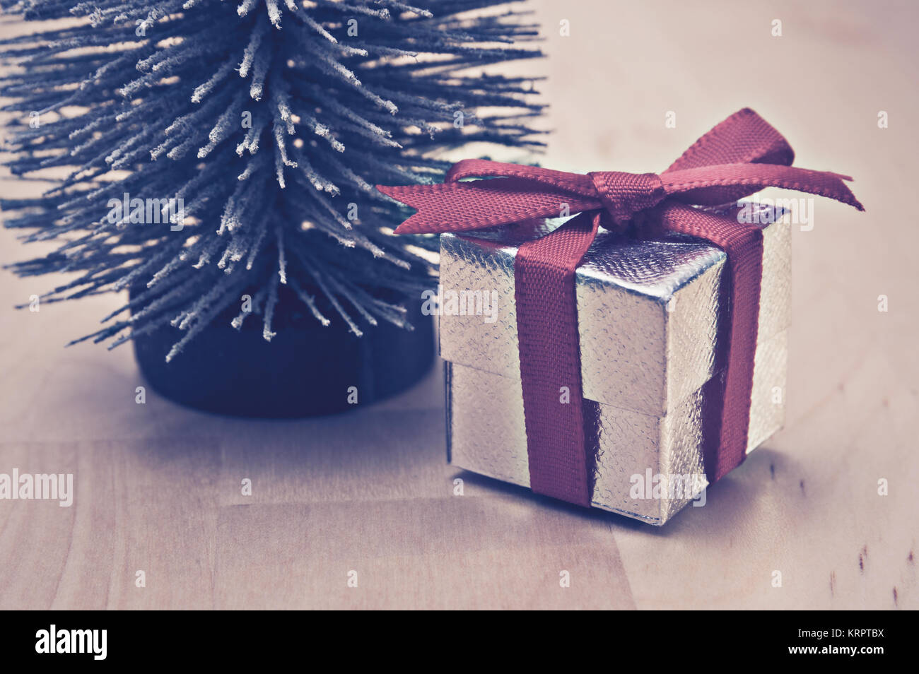 Gift box with red ribbon Stock Photo - Alamy