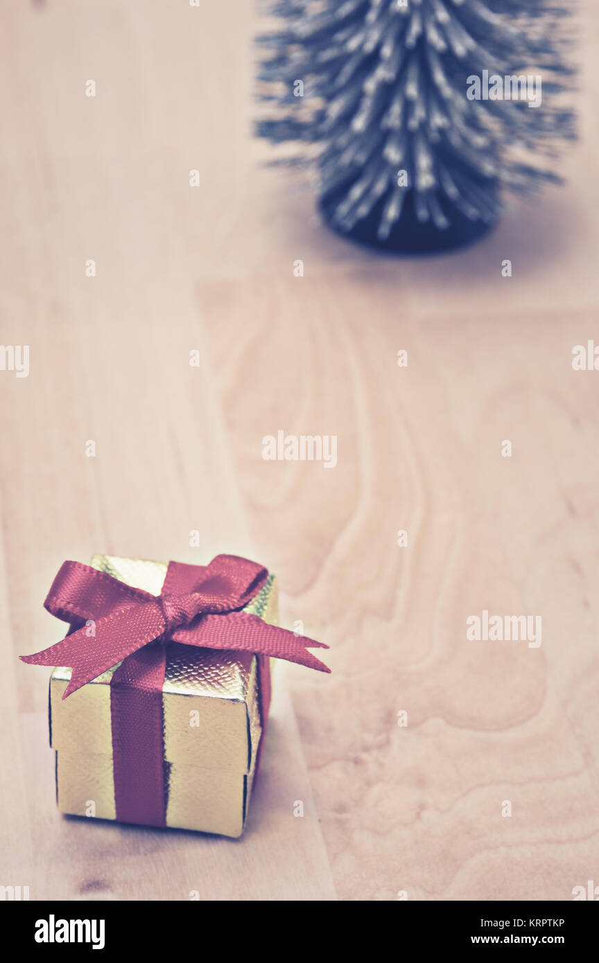 Gift box with red ribbon Stock Photo - Alamy