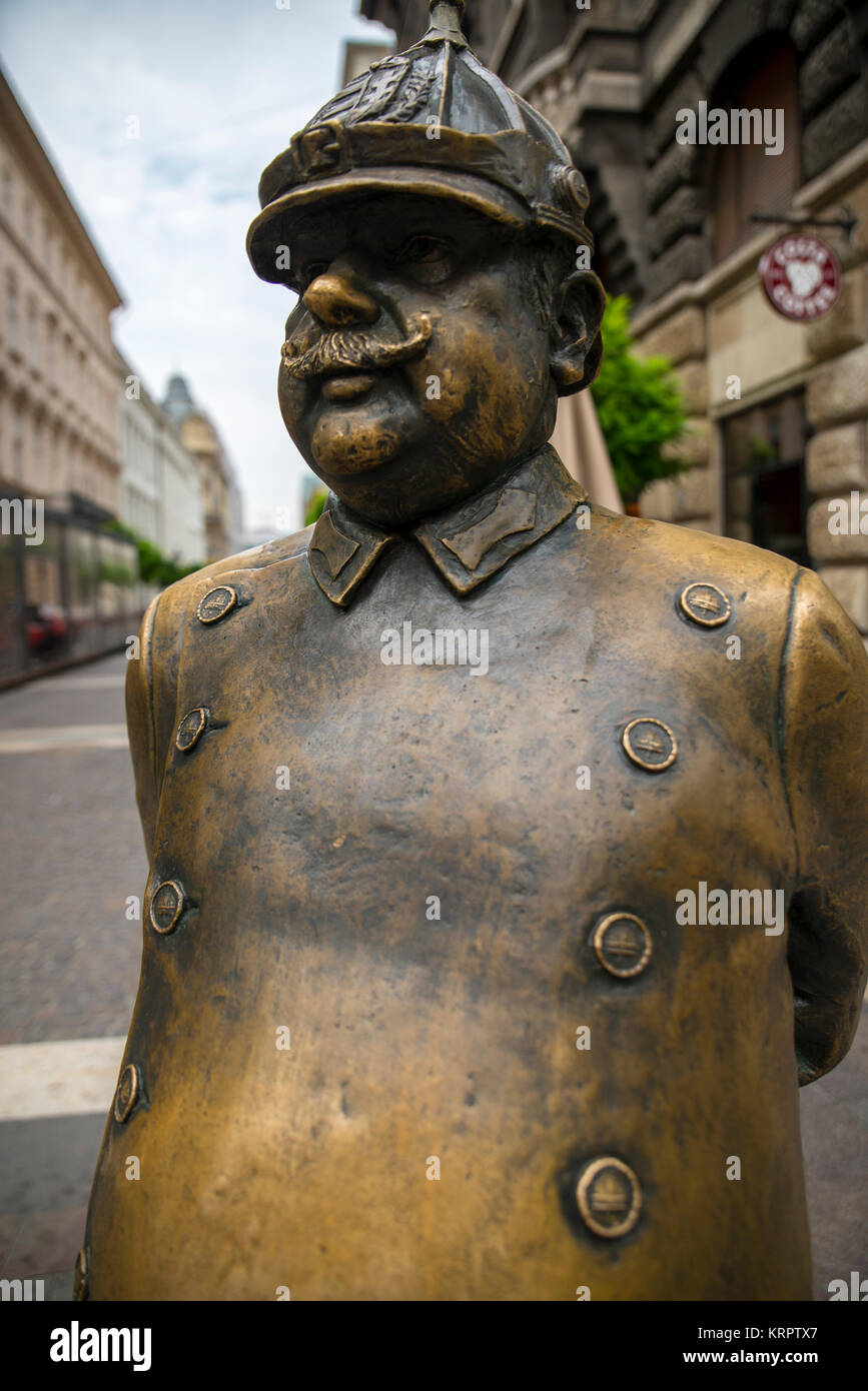 Fat policeman statue, Budapest, Hungary Stock Photo - Alamy