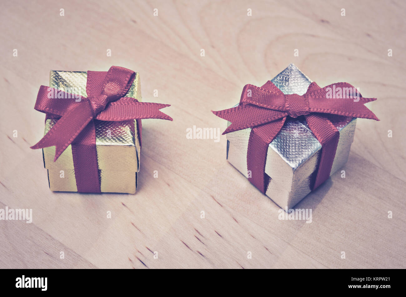 Gift box with red ribbon Stock Photo - Alamy