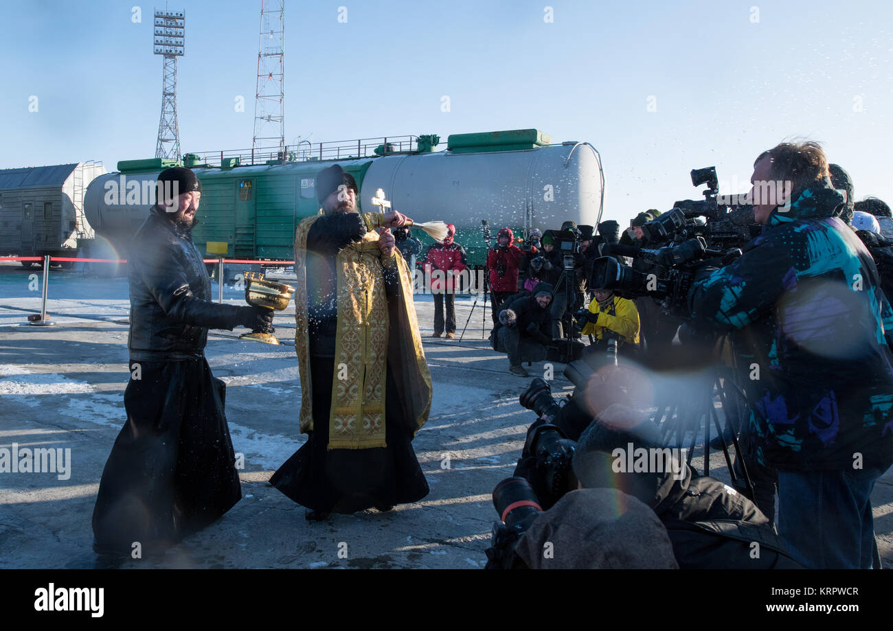 A Russian Orthodox Priest blesses reporters at the Baikonur Cosmodrome ...