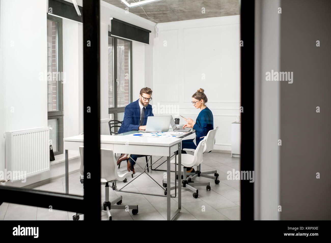 Analytic managers team working at the office Stock Photo - Alamy