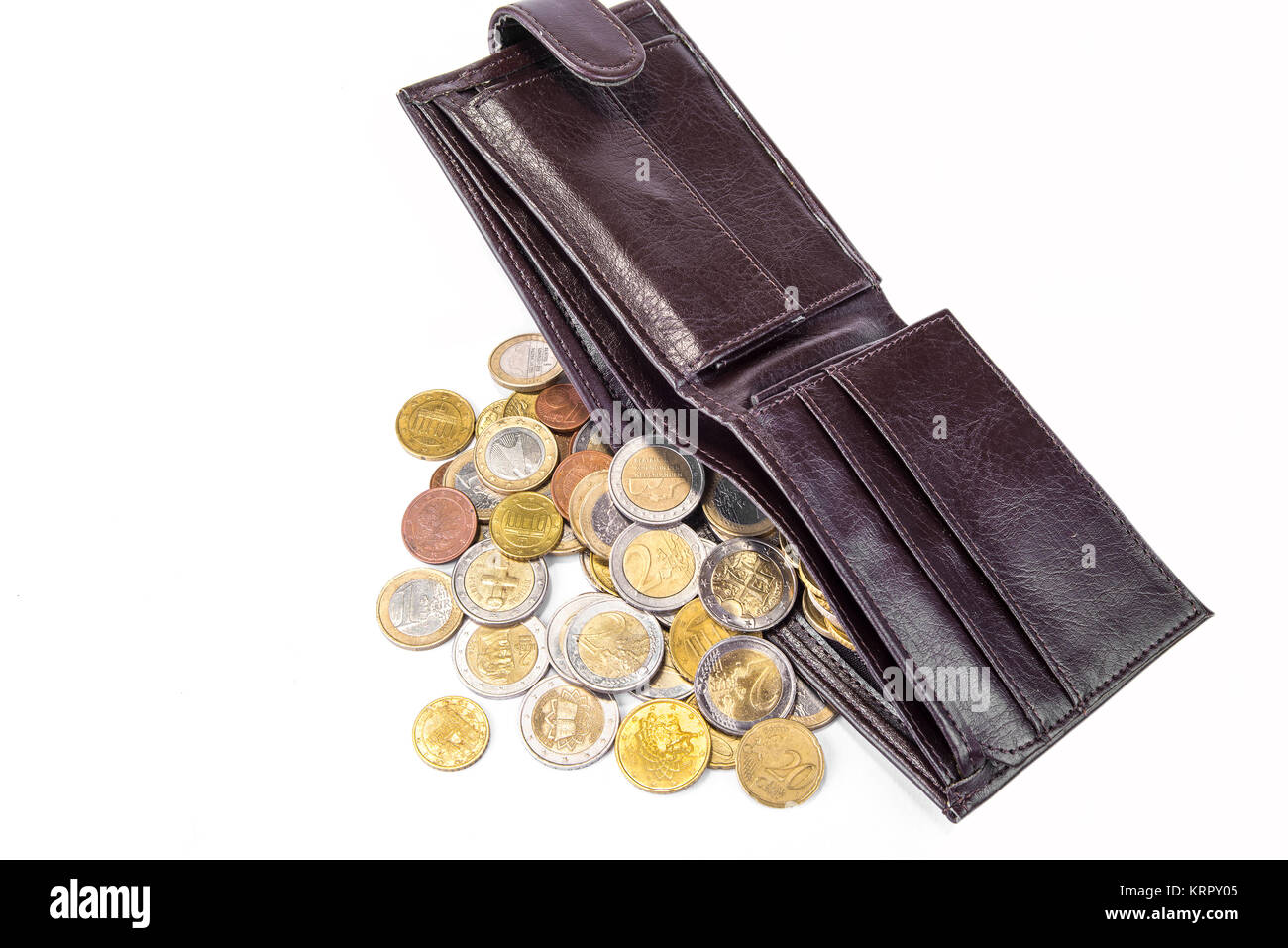 New wallet full of euro coins on white background Stock Photo - Alamy