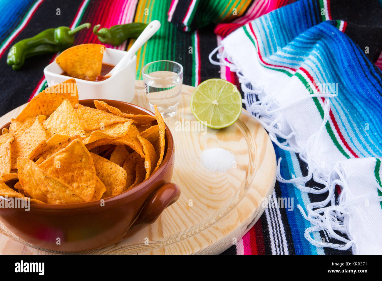 Nachos chips tequila lime and salt Stock Photo - Alamy