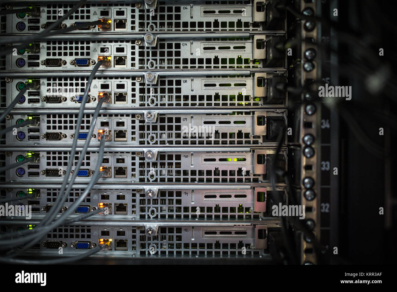 Server rack cluster in a data center (shallow DOF color toned image ...