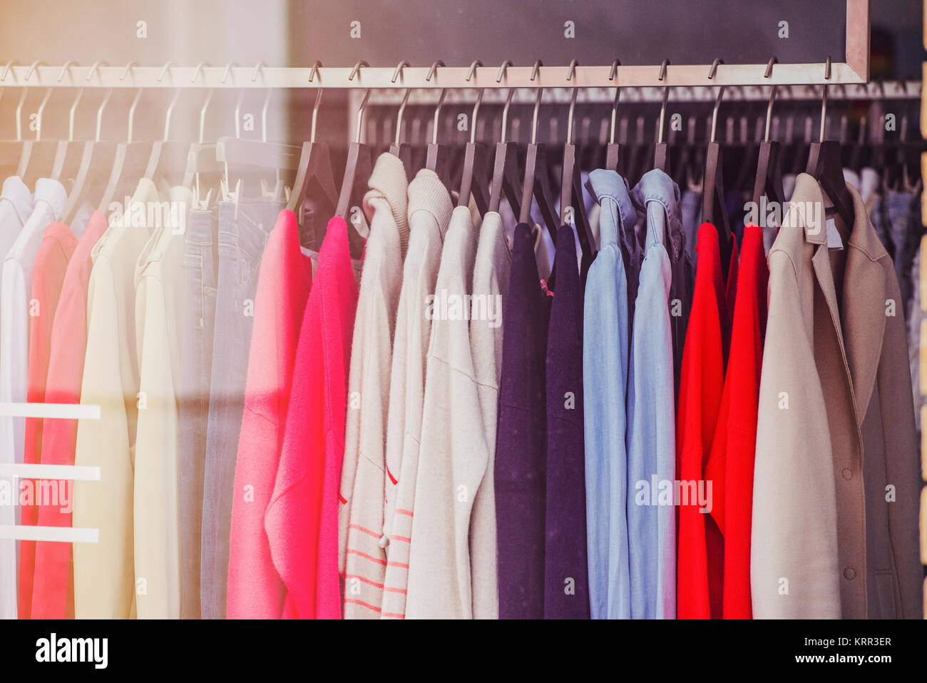 Women clothes on racks in a store in London Stock Photo - Alamy