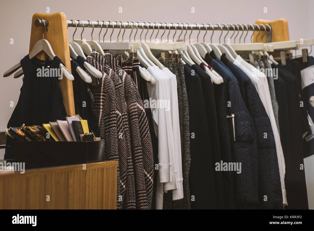 Women clothes on racks in a store in London Stock Photo - Alamy