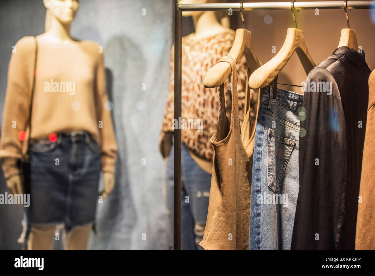 Women clothes on racks in a store in London Stock Photo - Alamy