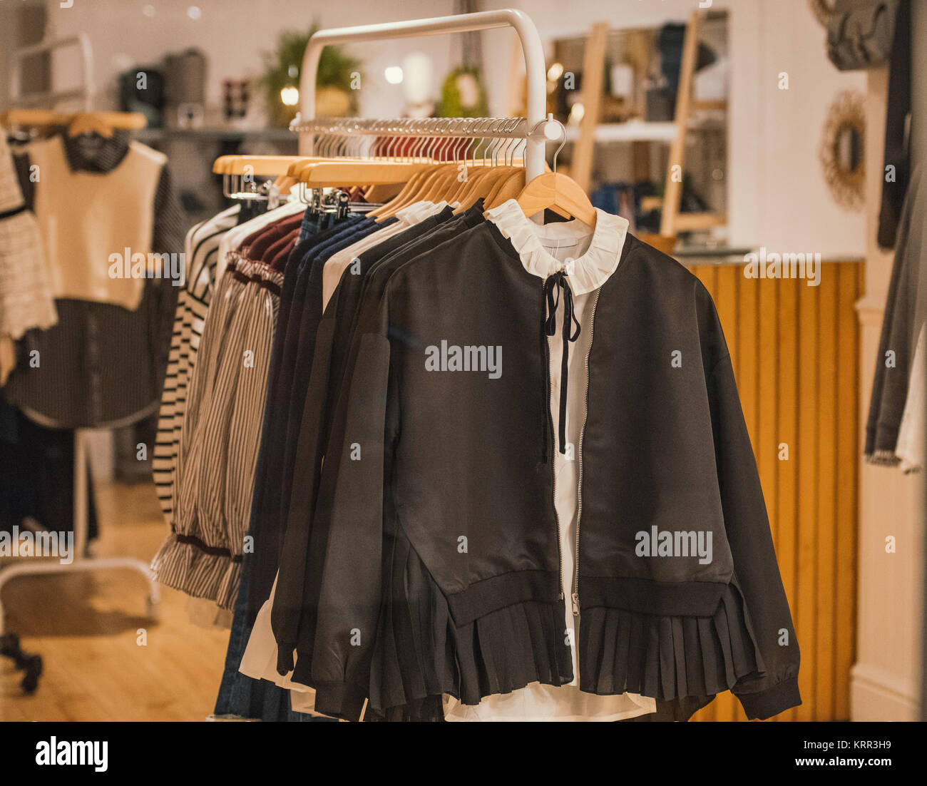 Elegant clothing store racks hi-res stock photography and images - Alamy