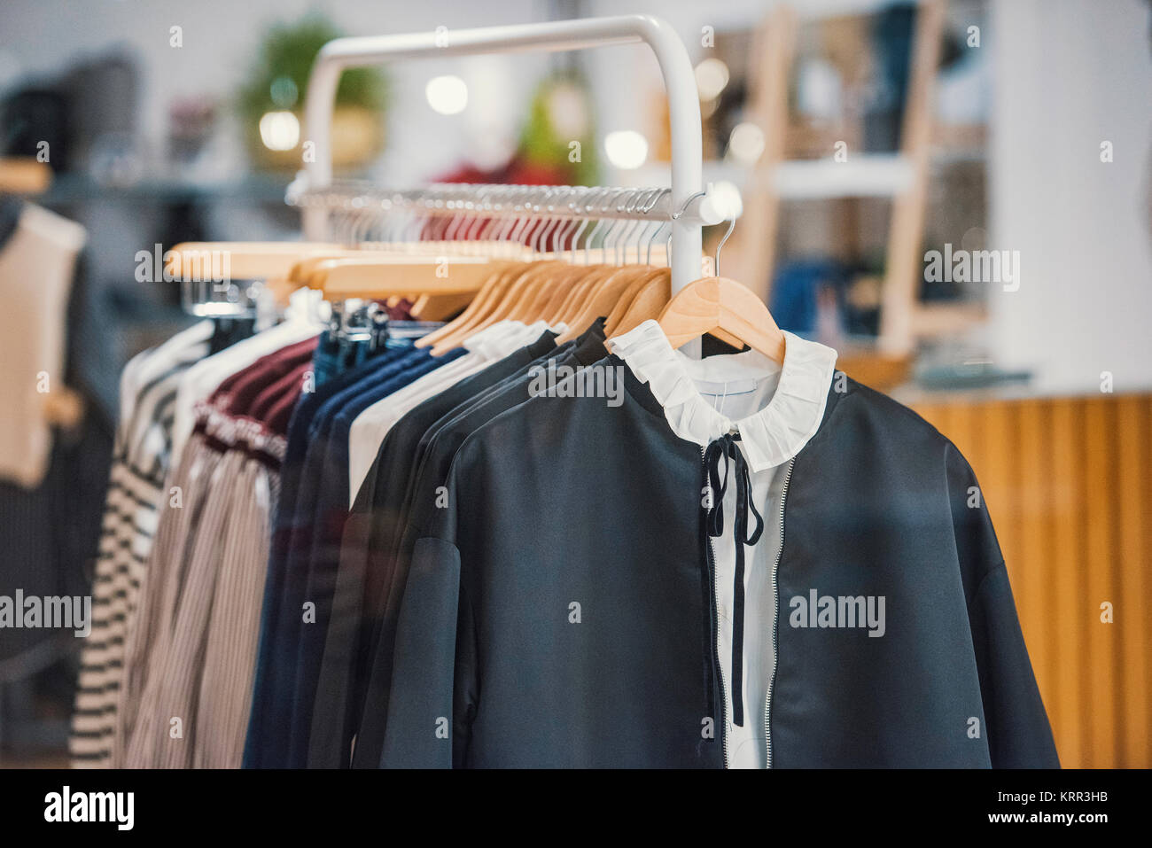 Women clothes on racks in a store in London Stock Photo - Alamy