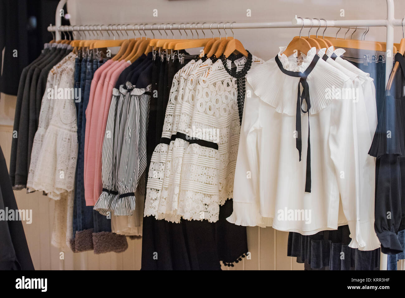 Women clothes on racks in a store in London Stock Photo - Alamy