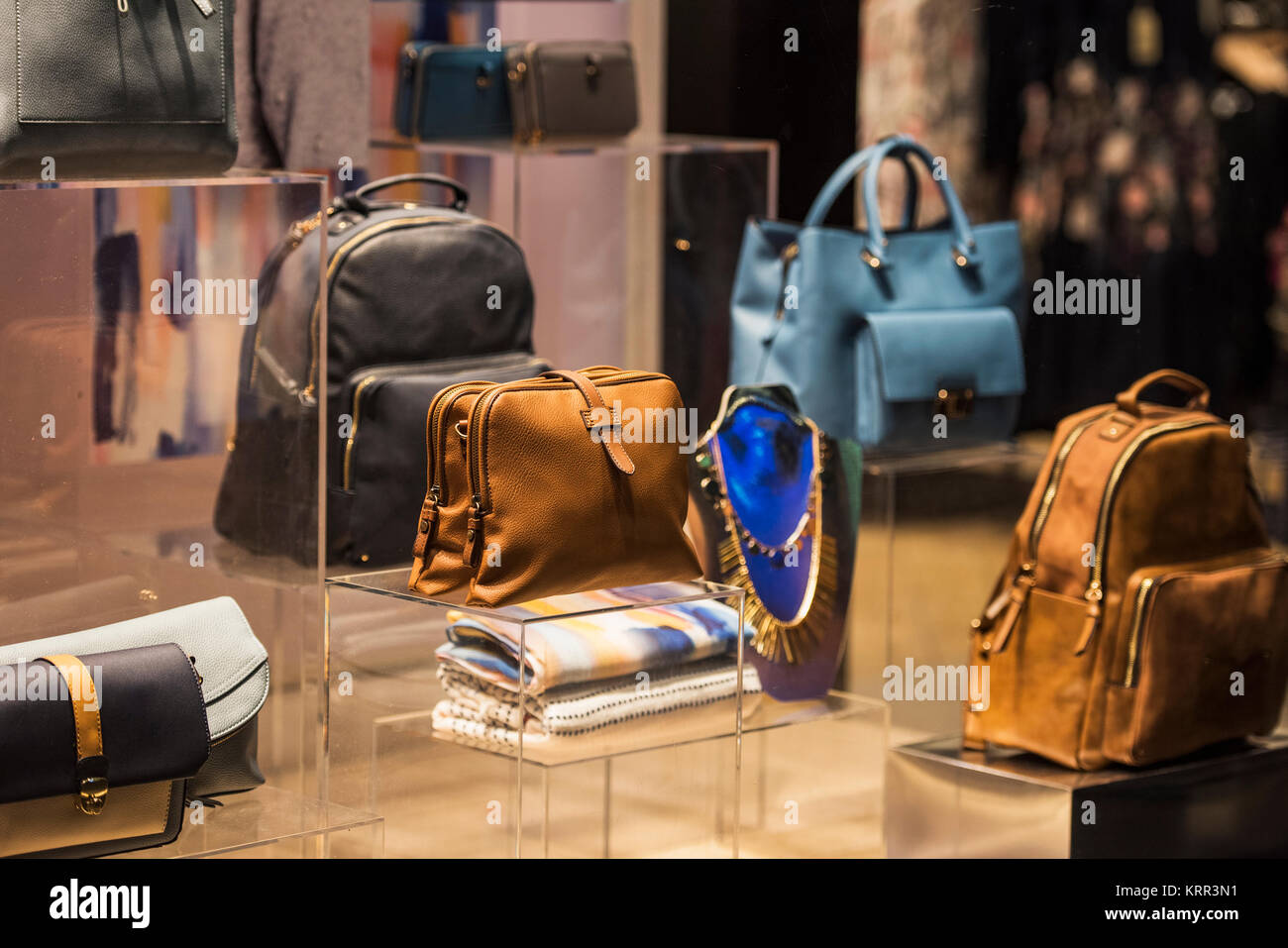 Stacks of clothes in a fashion store Stock Photo - Alamy