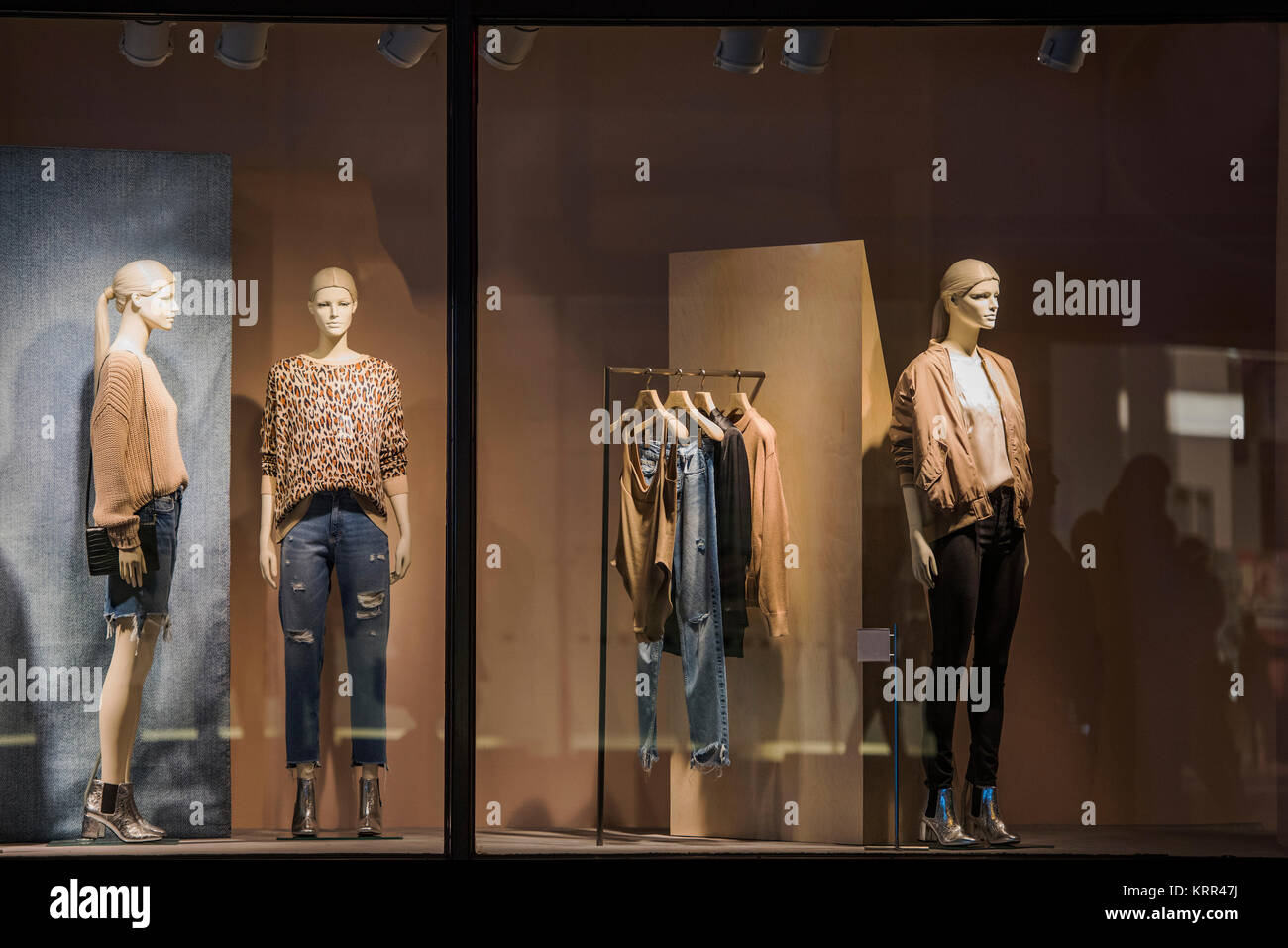 Fancy clothing on mannequins in a store in London Stock Photo - Alamy