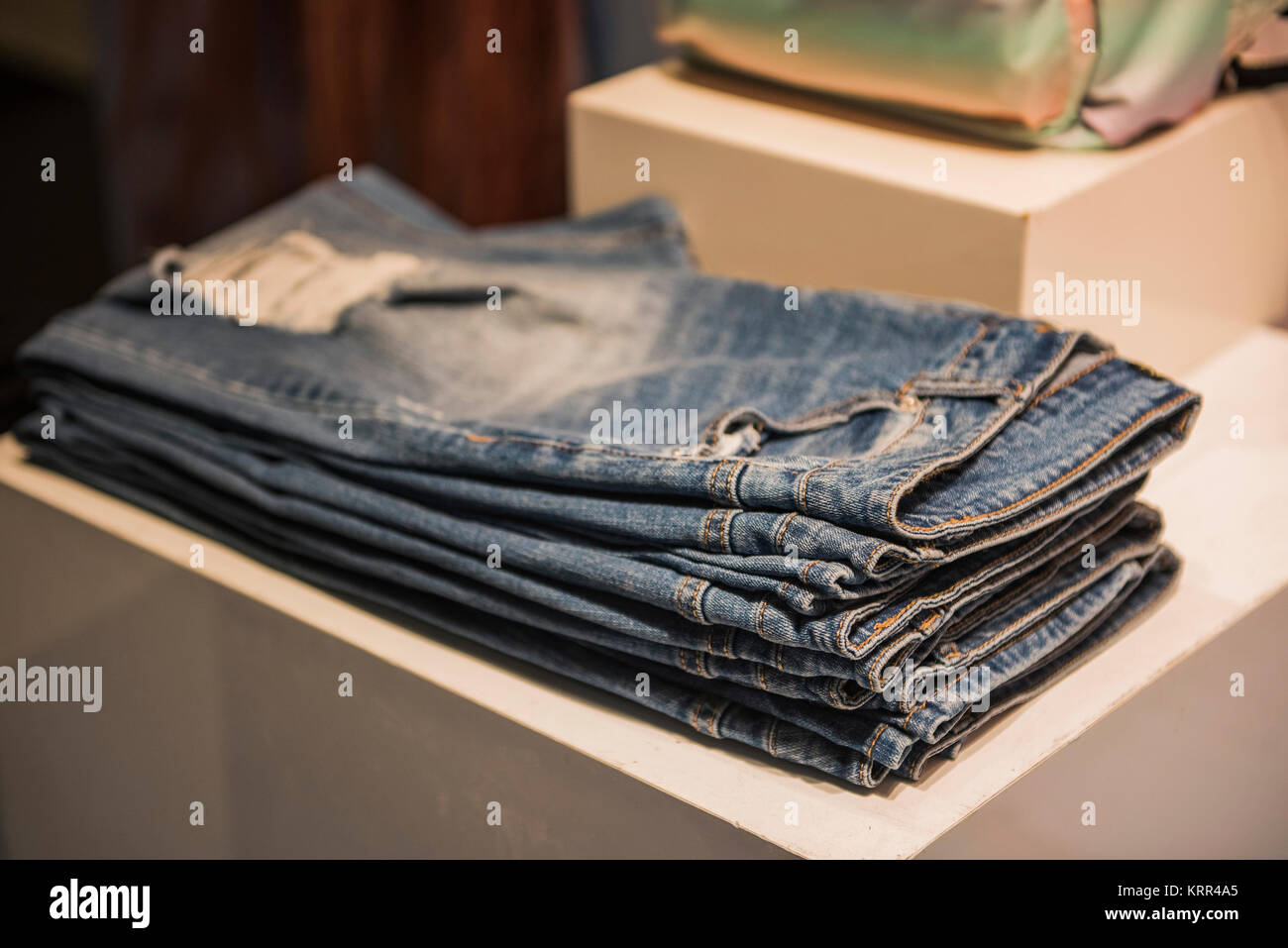 Jeans in a store Stock Photo - Alamy