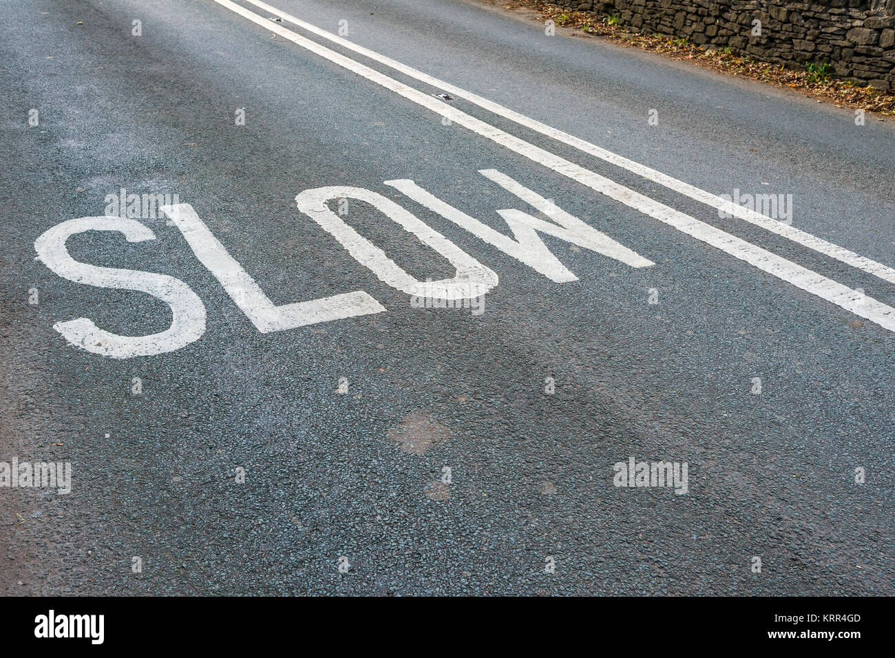 Slow down on the road Stock Photo - Alamy