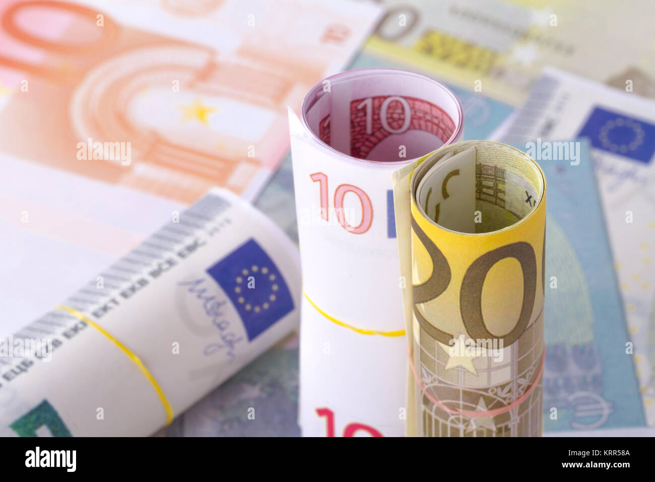 Stack of banknote with money consuming Stock Photo - Alamy