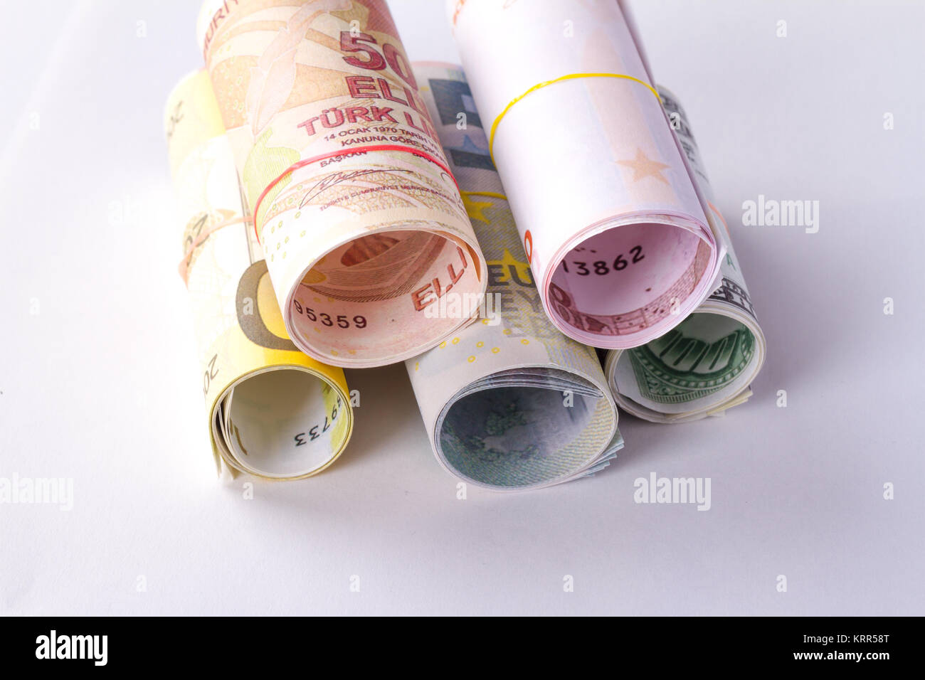 Stack of banknote with money consuming Stock Photo - Alamy
