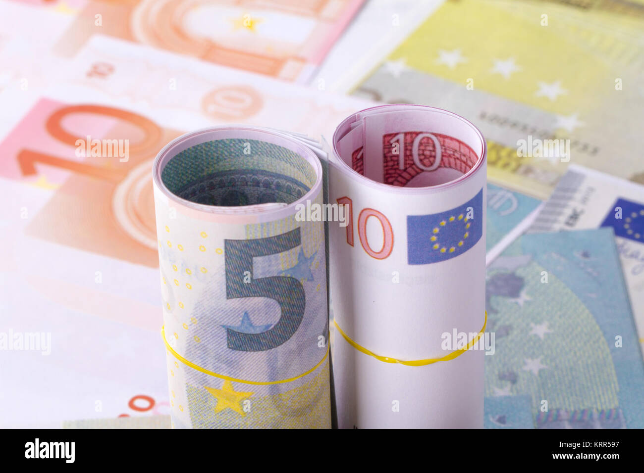 Stack of banknote with money consuming Stock Photo - Alamy