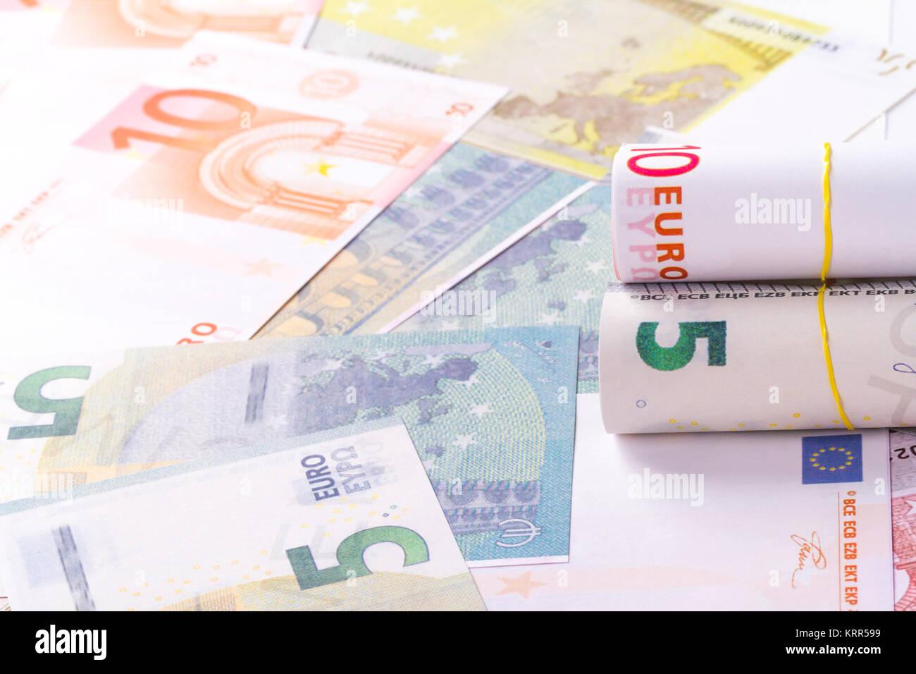 Stack of banknote with money consuming Stock Photo - Alamy