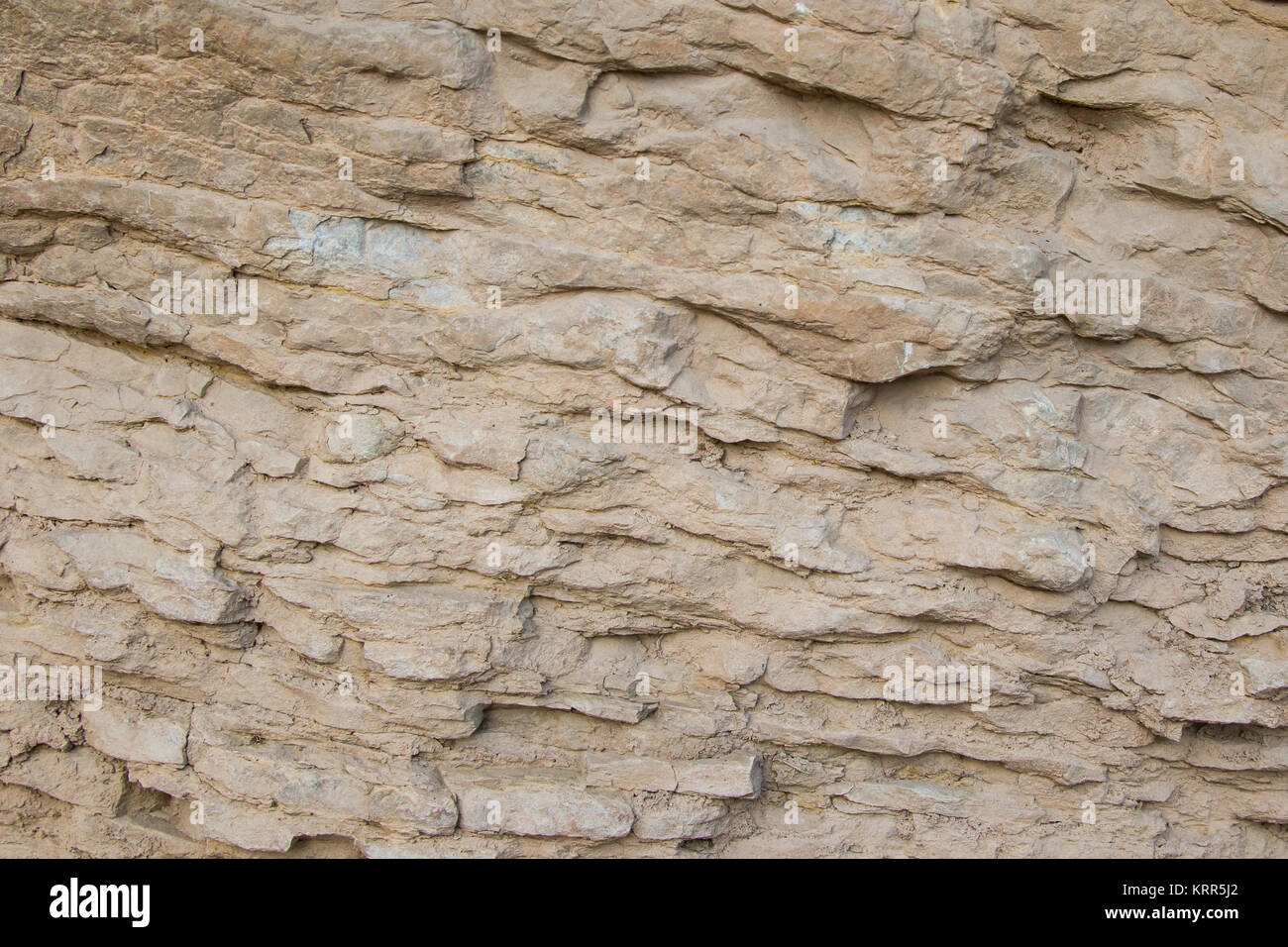 Close up of a rock wall showing layers and textures Stock Photo - Alamy