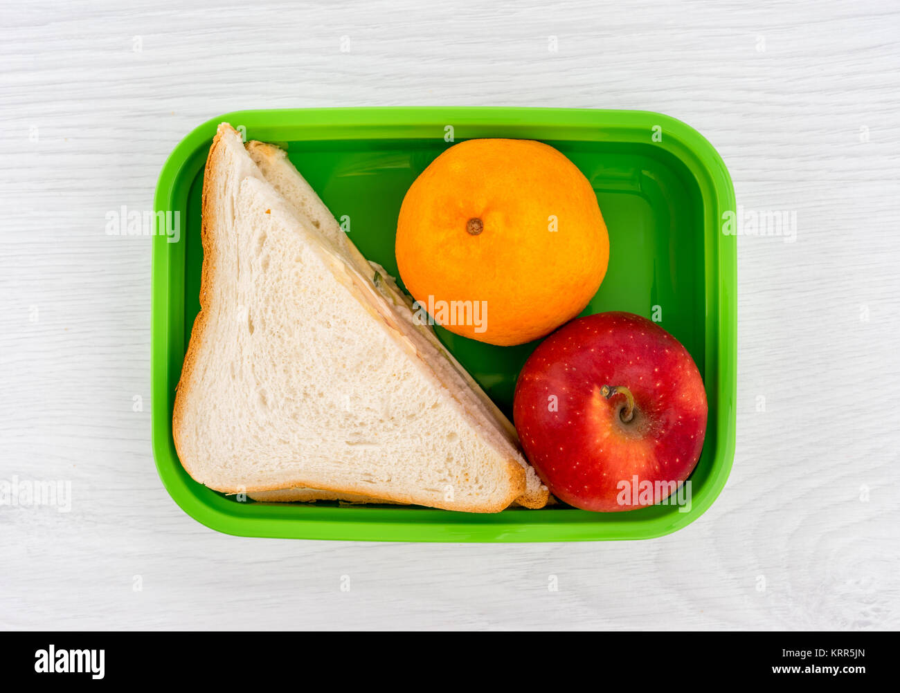 School lunch box on white background top view Stock Photo - Alamy