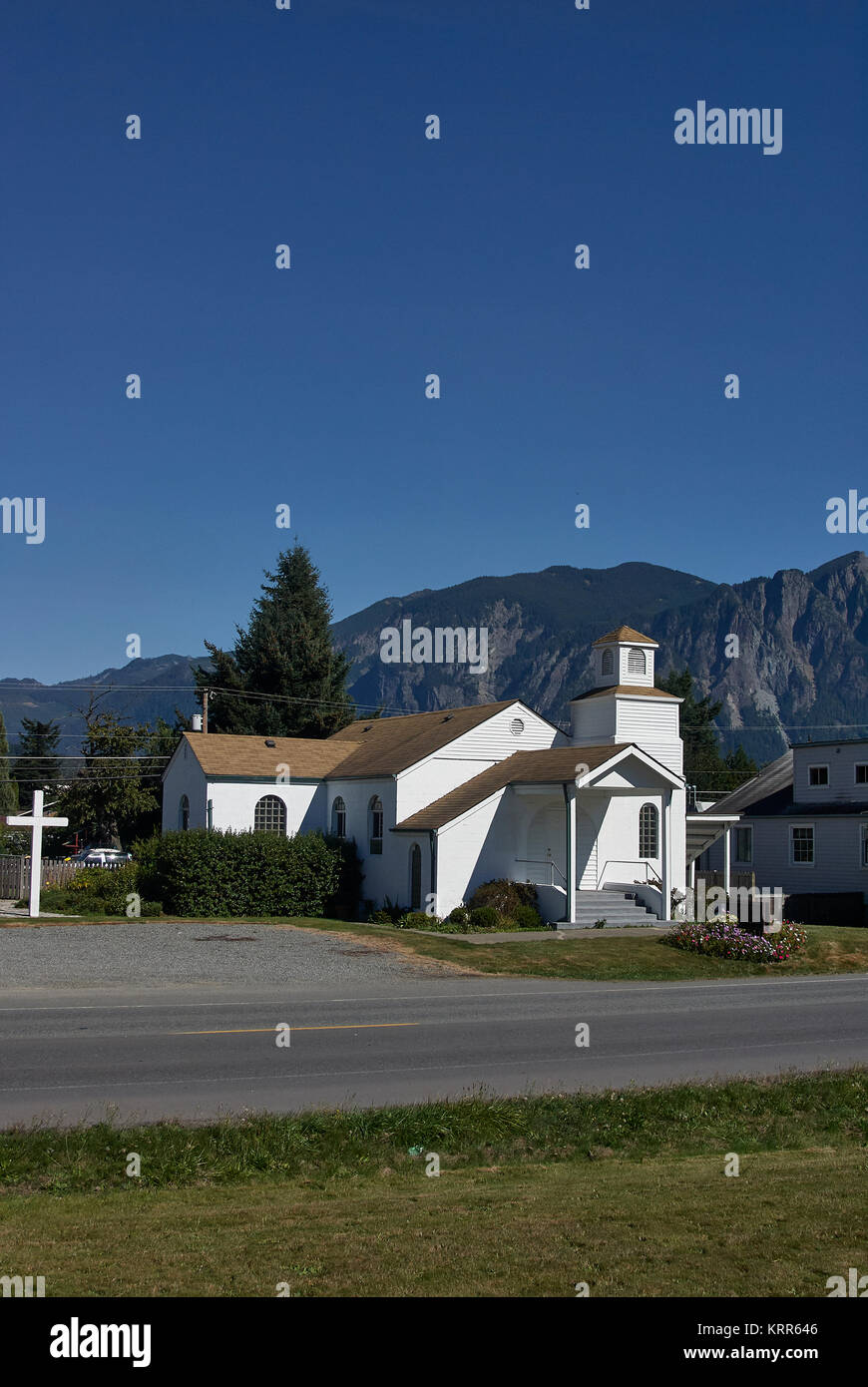 a small white timber chapel in a coutry town in washington state Stock ...