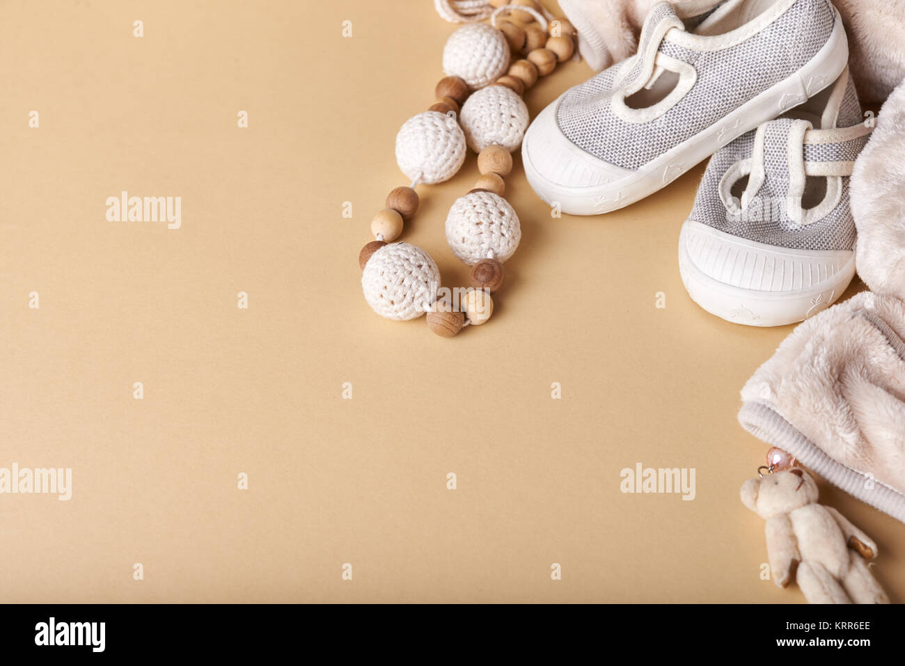 babies clothes and toys on beige color. cope space Stock Photo - Alamy
