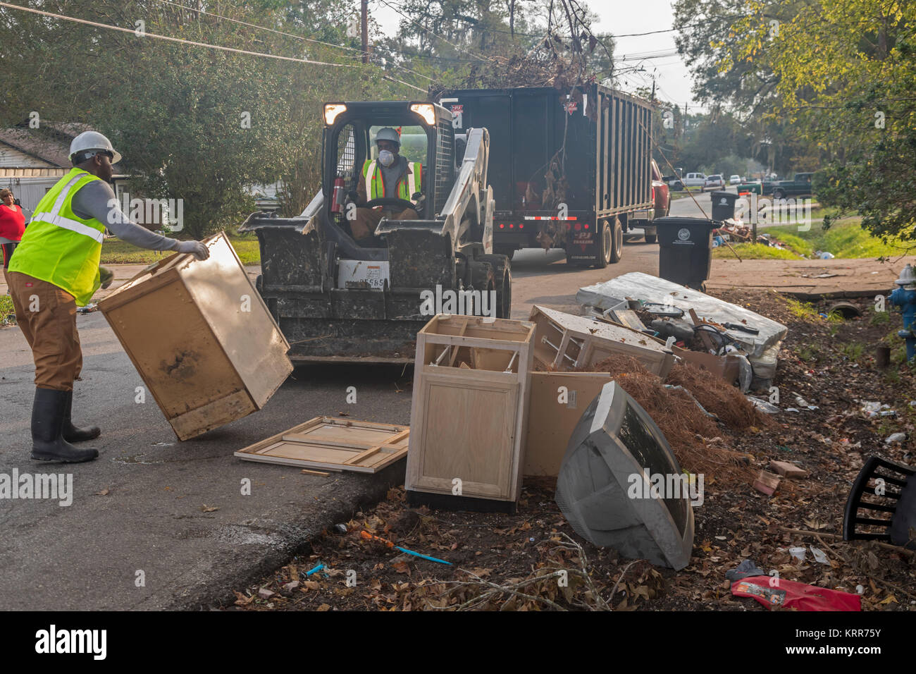 Houston, Texas - Workers pick up trash and debris from Hurricane Harvey ...