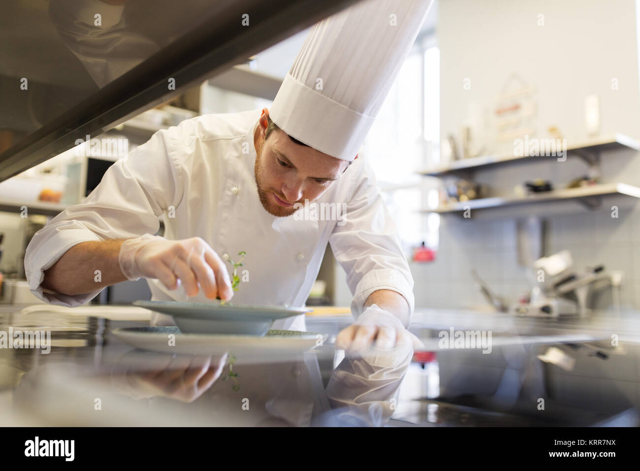 happy male chef cooking food at restaurant kitchen Stock Photo - Alamy