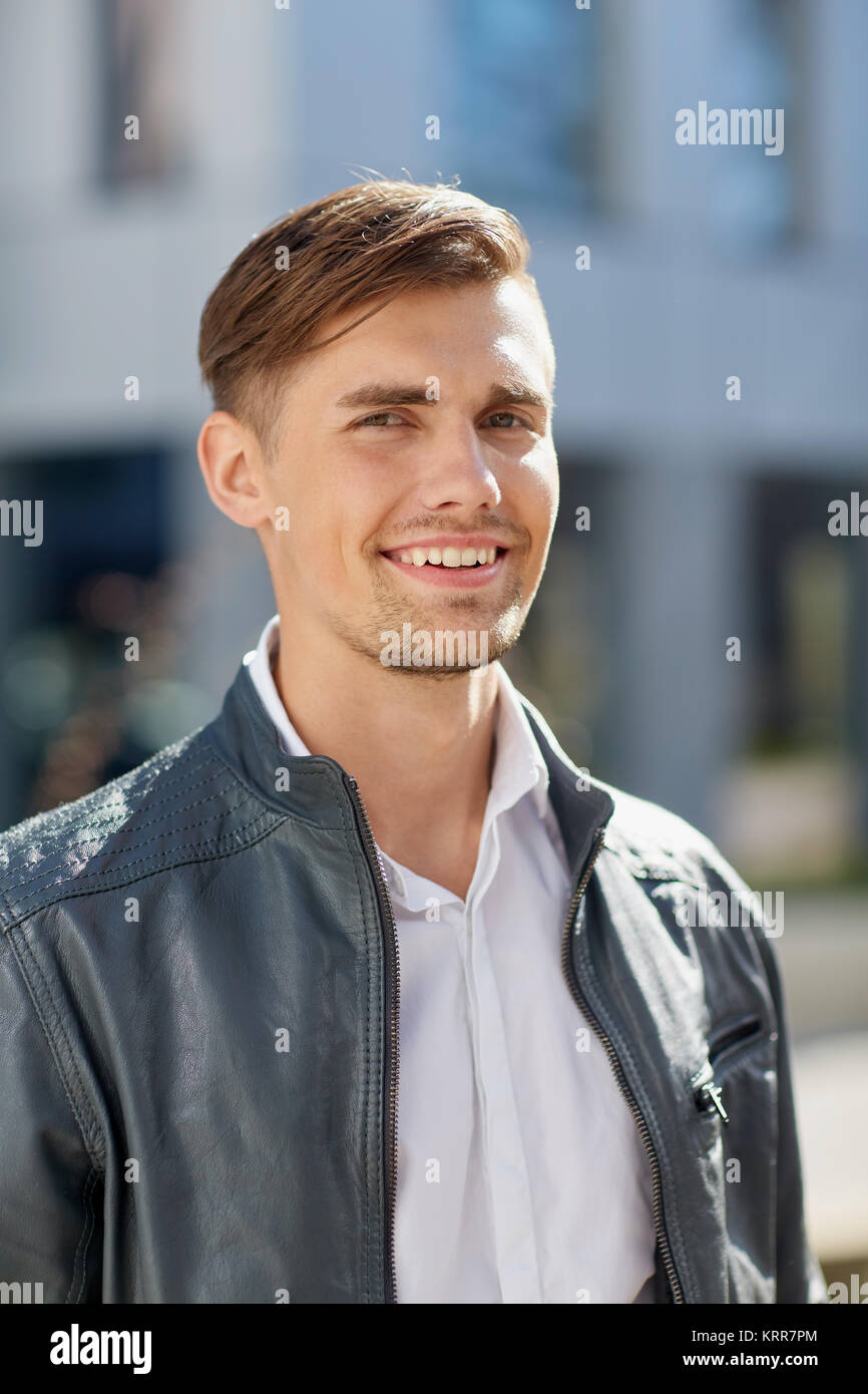 portrait of young man in leather jacket outdoors Stock Photo - Alamy