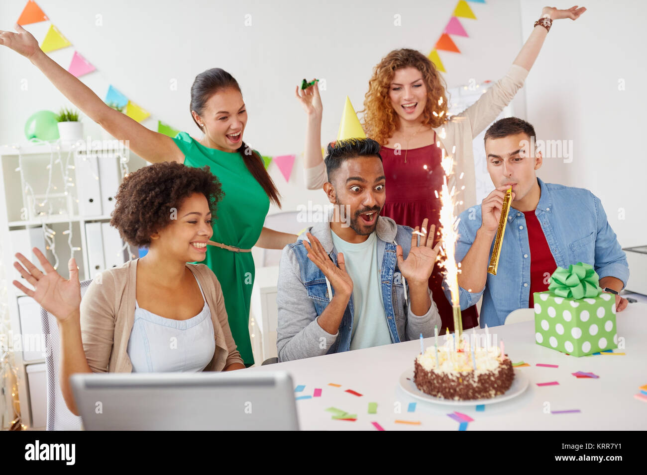 office team greeting colleague at birthday party Stock Photo - Alamy