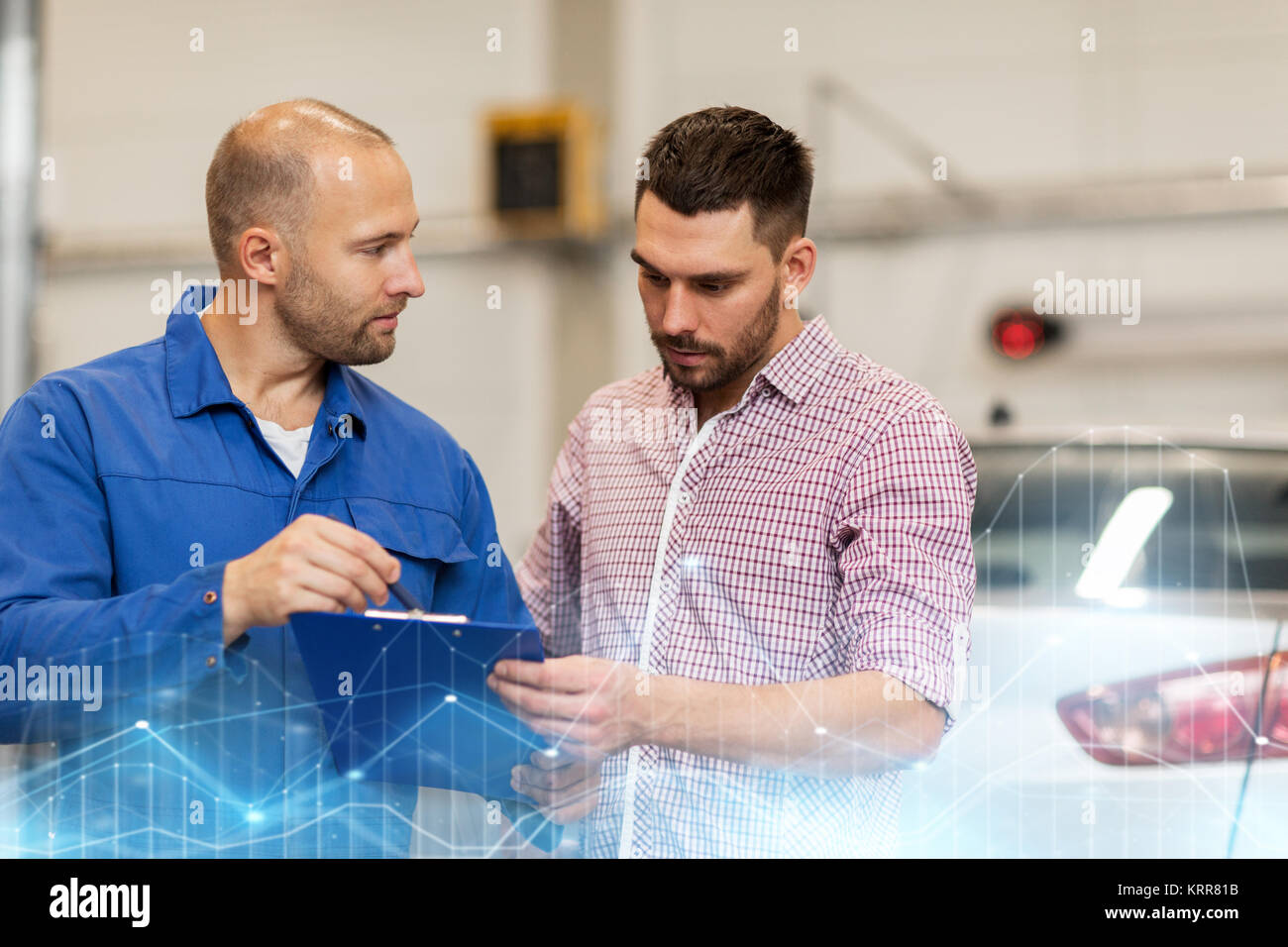 auto mechanic with clipboard and man at car shop Stock Photo - Alamy