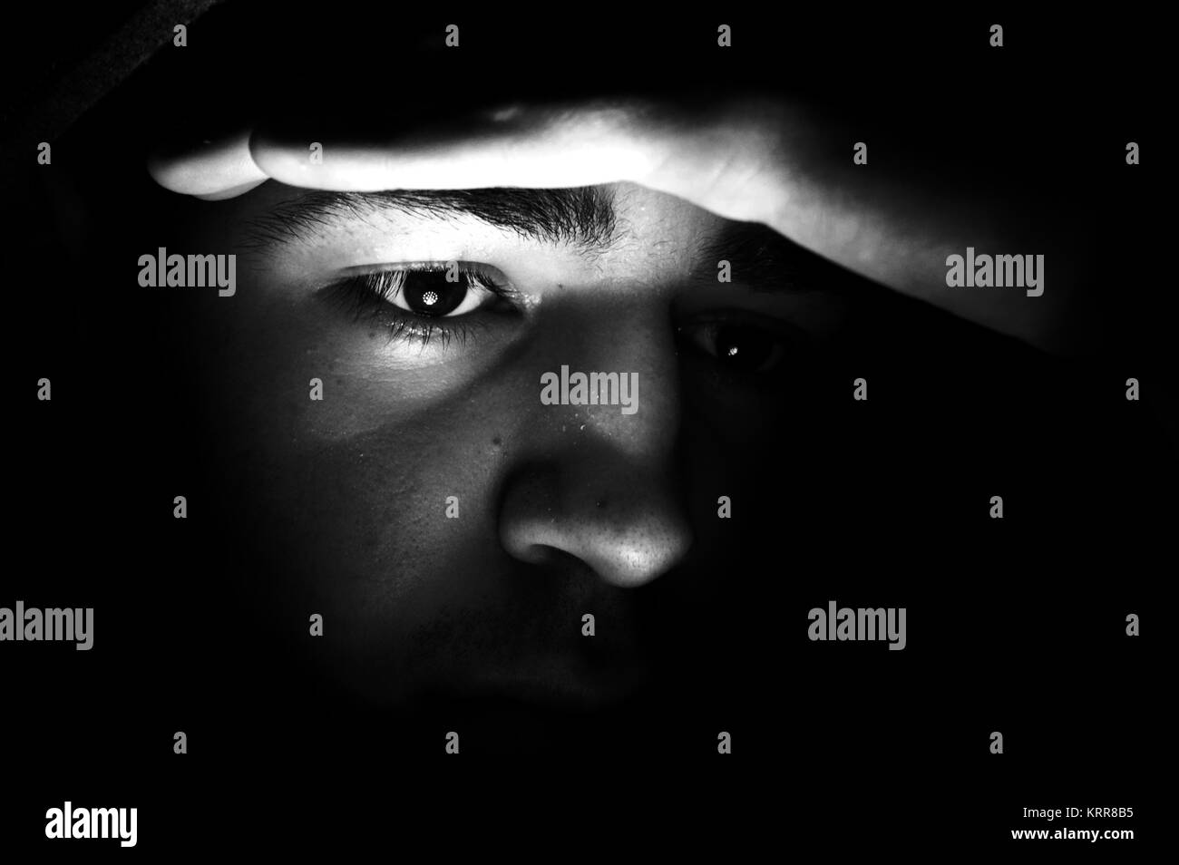young man and shadow Stock Photo - Alamy
