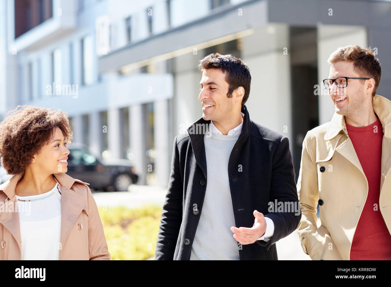 office workers or friends talking on city street Stock Photo - Alamy