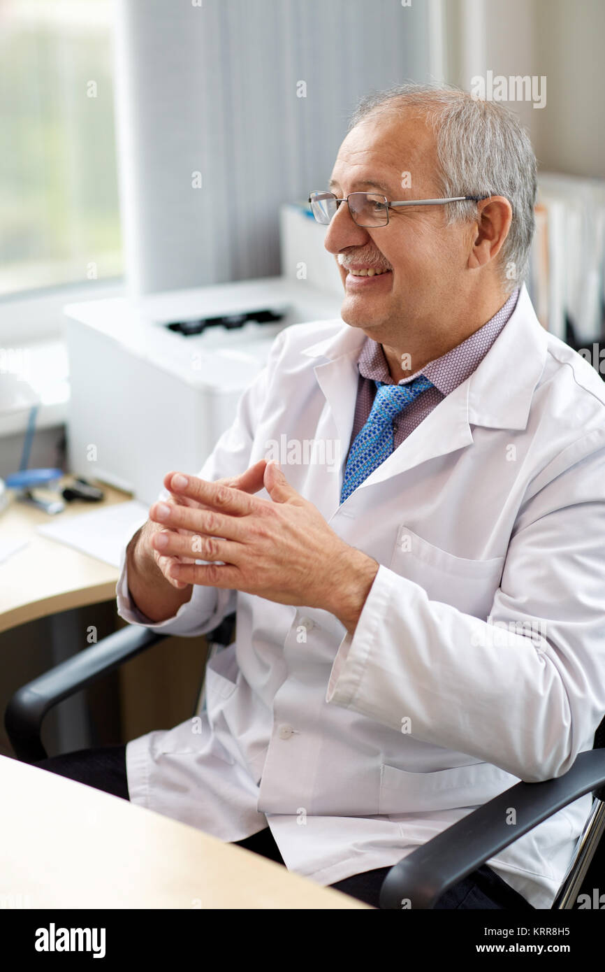 happy smiling doctor at medical office in hospital Stock Photo - Alamy