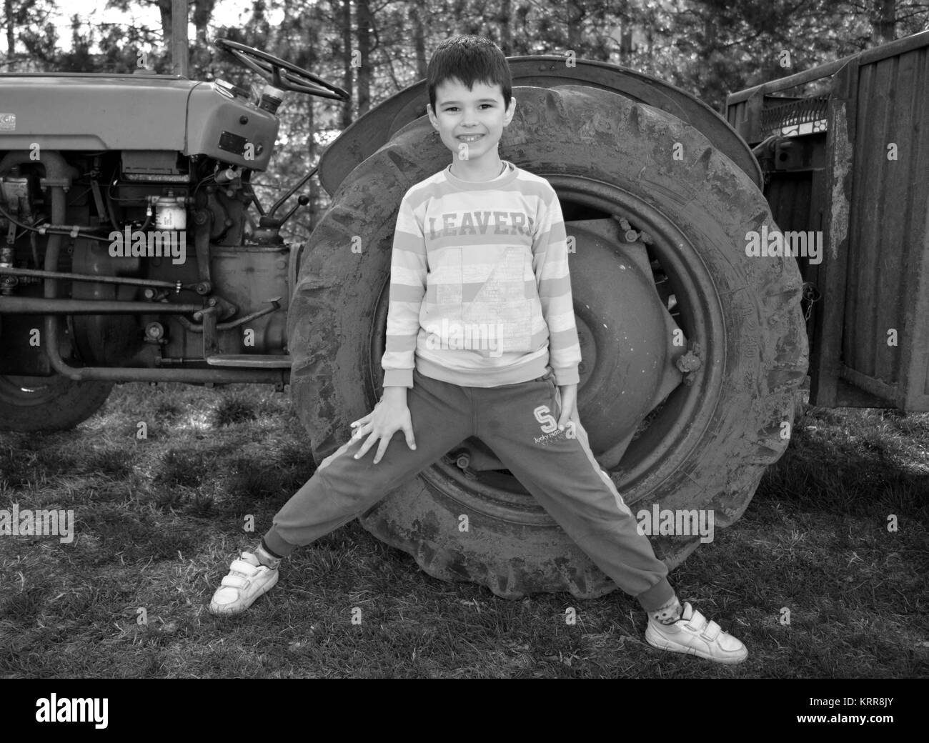 boy and tractor Stock Photo - Alamy