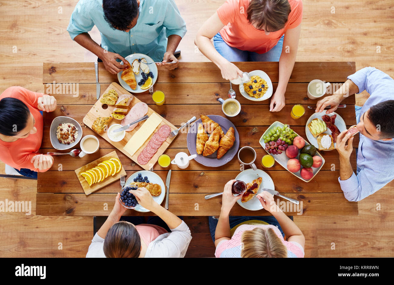 Group people breakfast table hi-res stock photography and images - Alamy