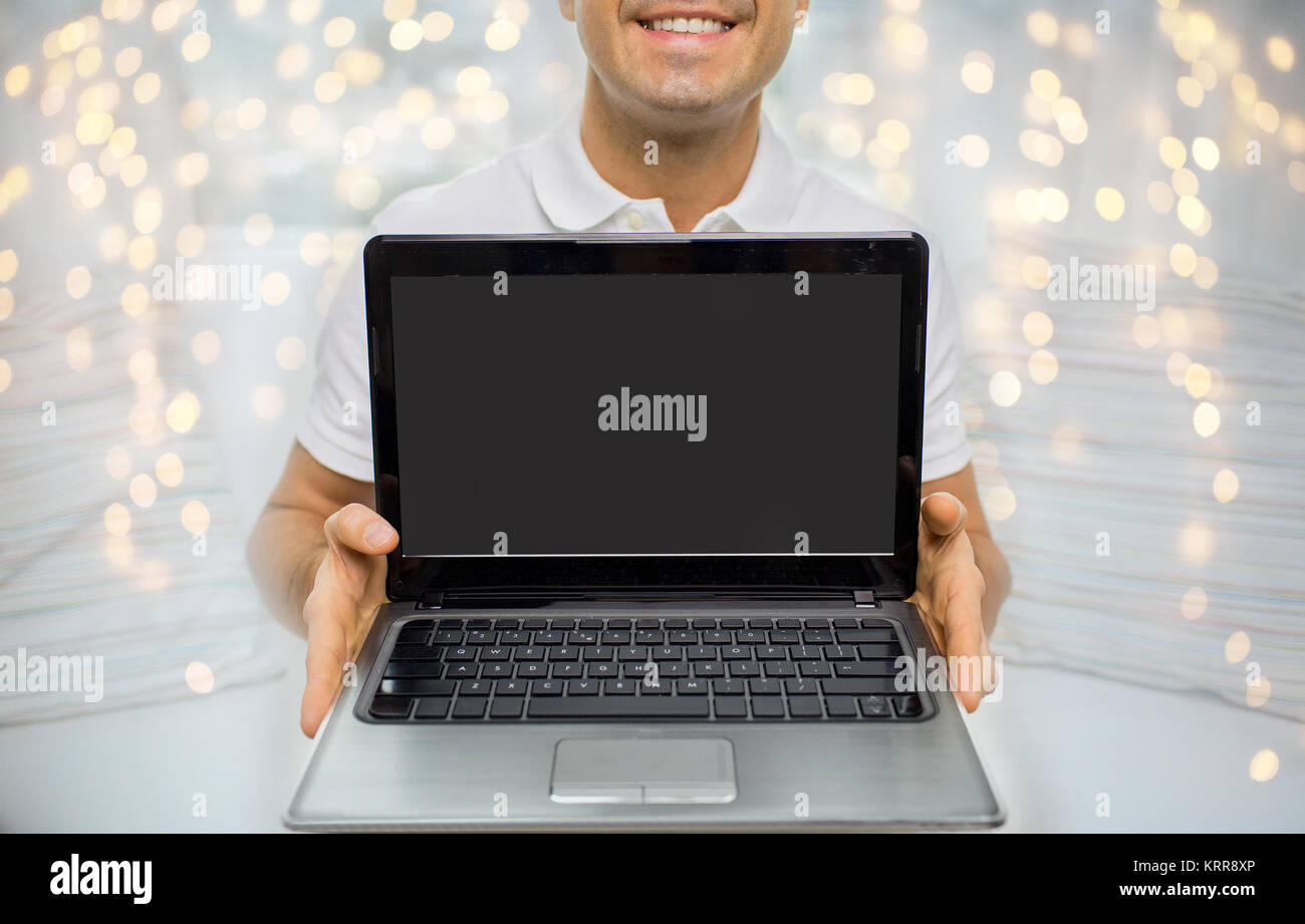 Happy man laptop showing hi-res stock photography and images - Alamy