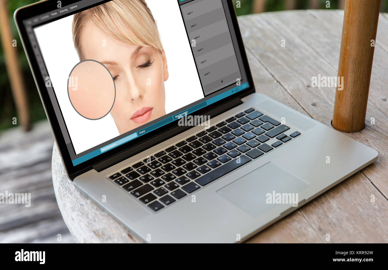 laptop with woman face retouch in graphics editor Stock Photo - Alamy