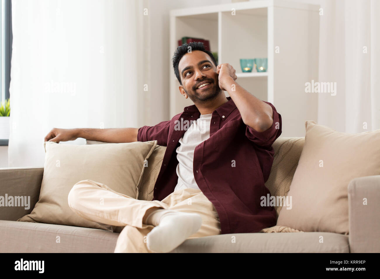 happy man calling on smartphone at home Stock Photo - Alamy