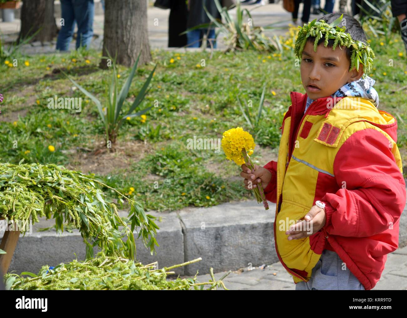 boy selling flowers Stock Photo - Alamy
