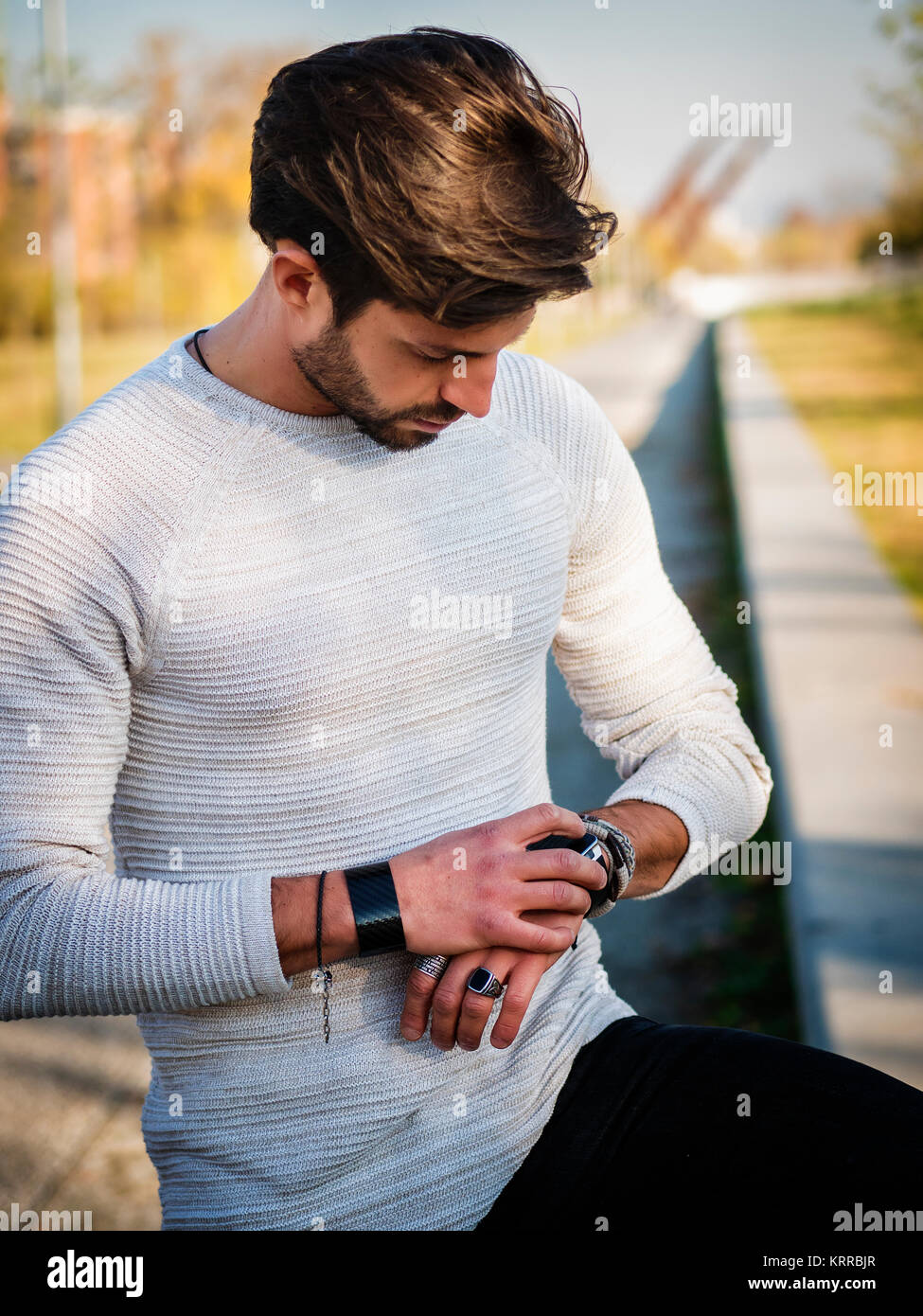 Male hand using smartwatch outdoor hi-res stock photography and images ...