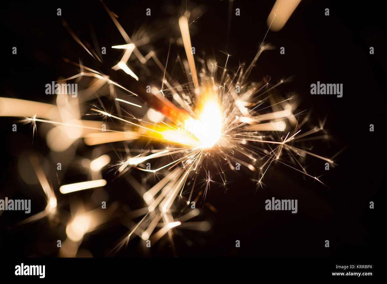 sparkler on a black background Stock Photo - Alamy
