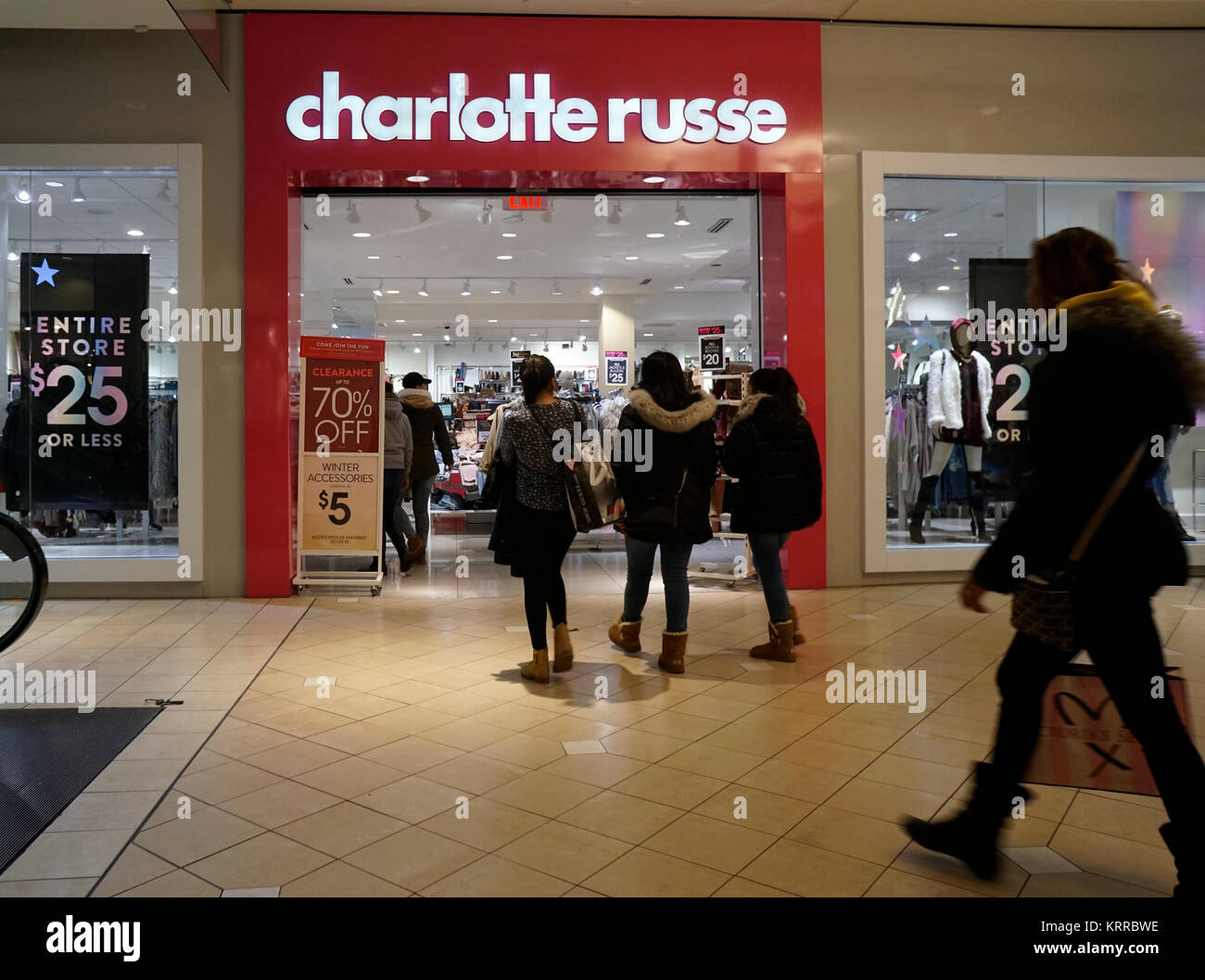 Customers enter the Charlotte Russe store in the Queens Center Mall in ...