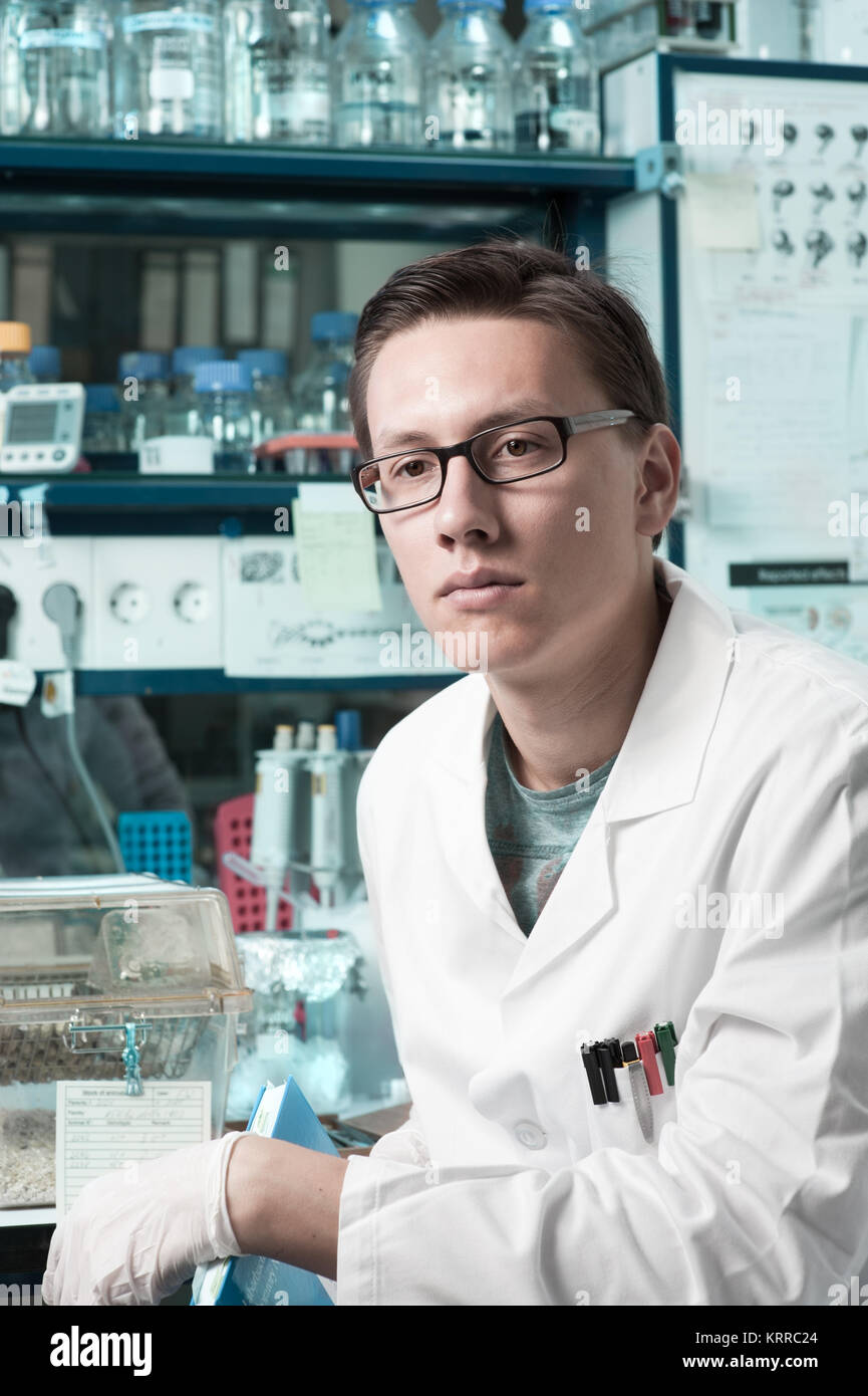 Young scientist or a Ph.D. student in research laboratory Stock Photo ...